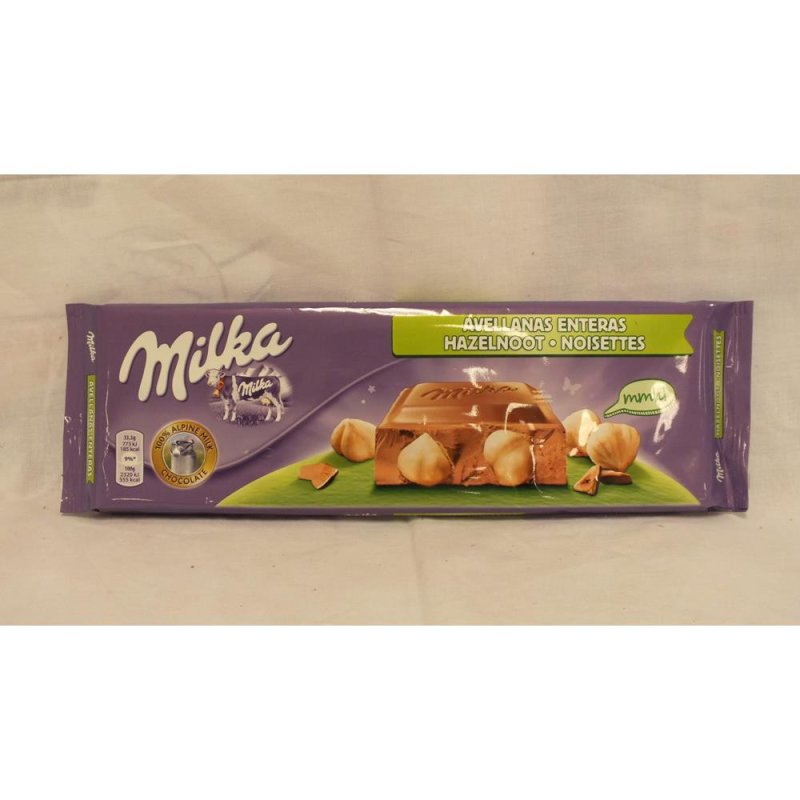 Milka Schokoladen-Tafel ganze Haselnüsse, 300g